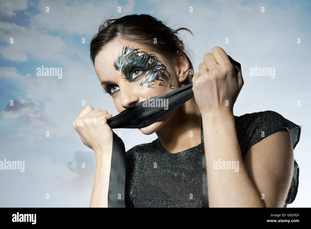 Girl with beautiful artistic face painting - make up Stock Photo - Alamy