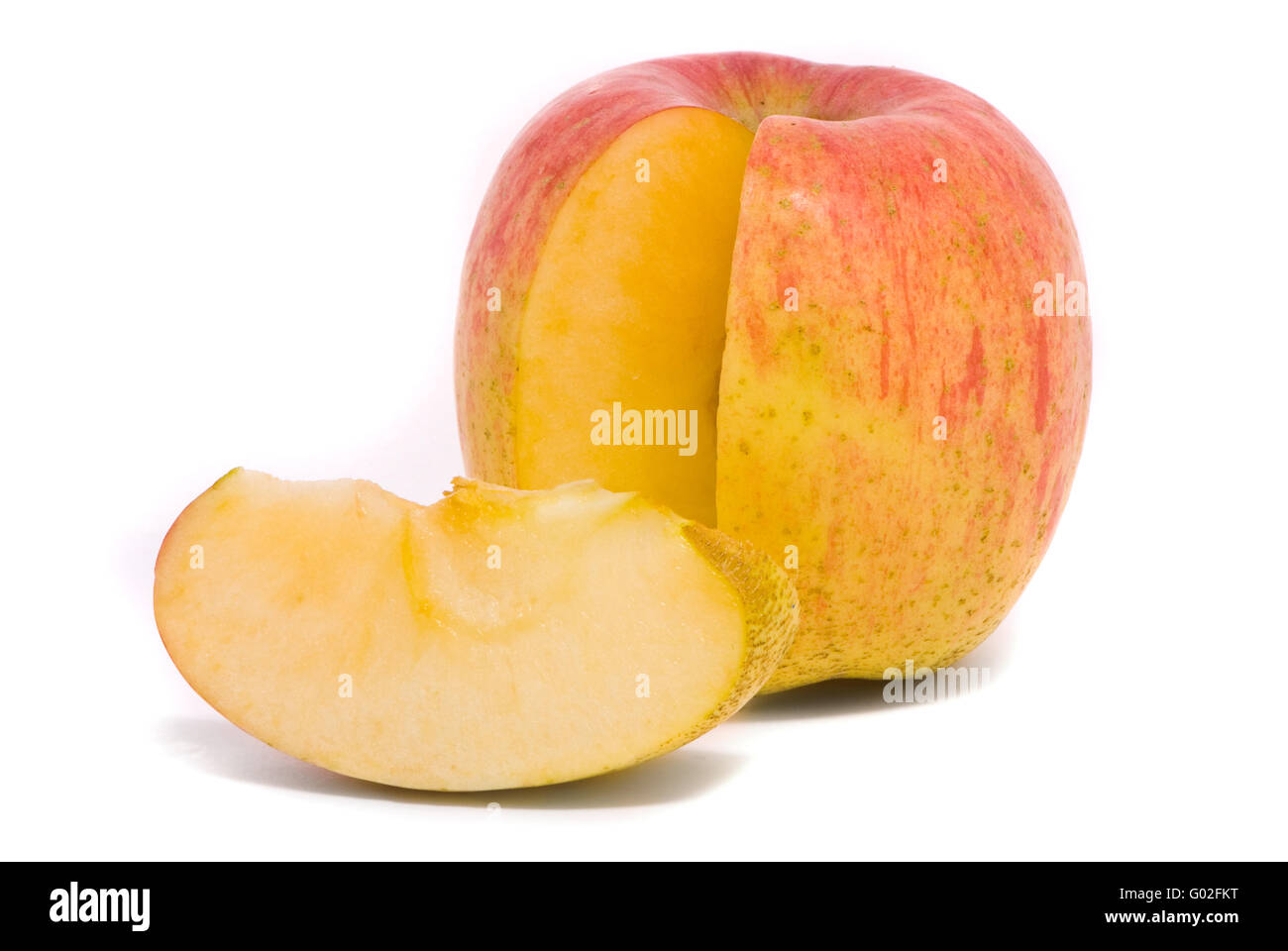 Sliced yellow ripe apple isolated on white background Stock Photo - Alamy