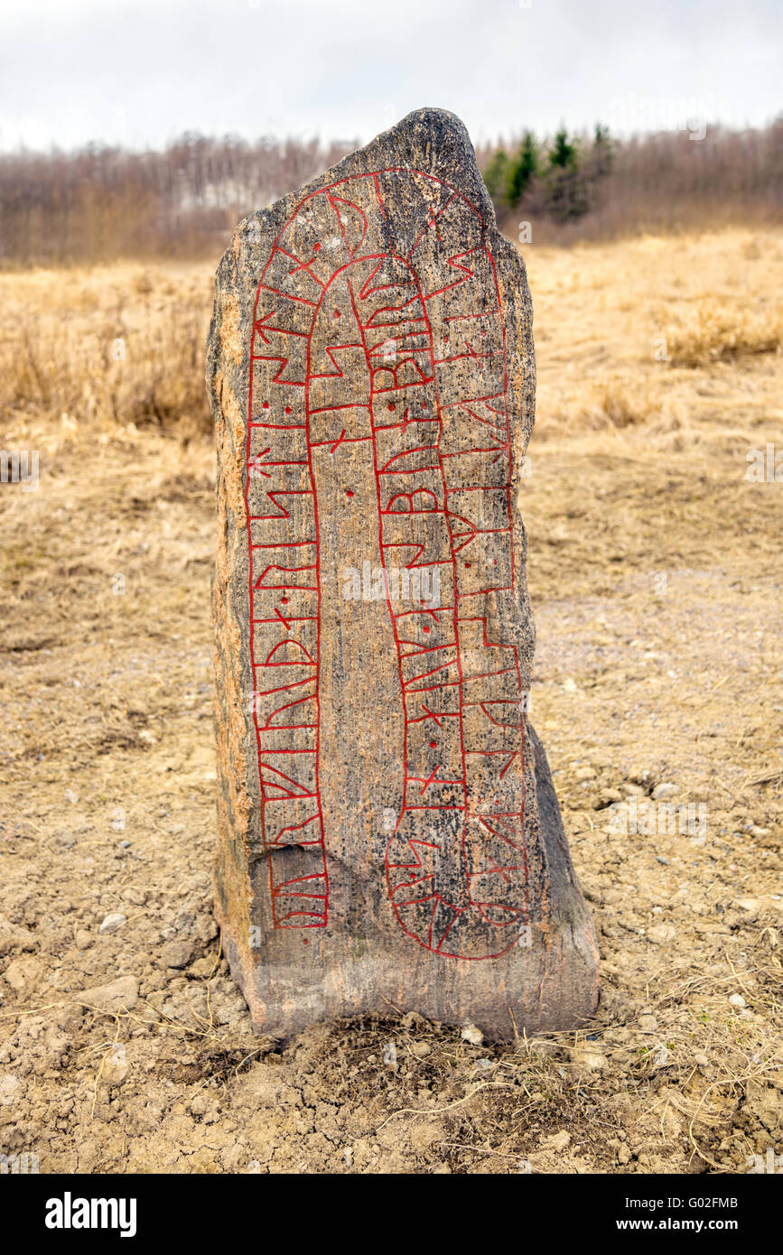 Rune stone on a field Stock Photo - Alamy