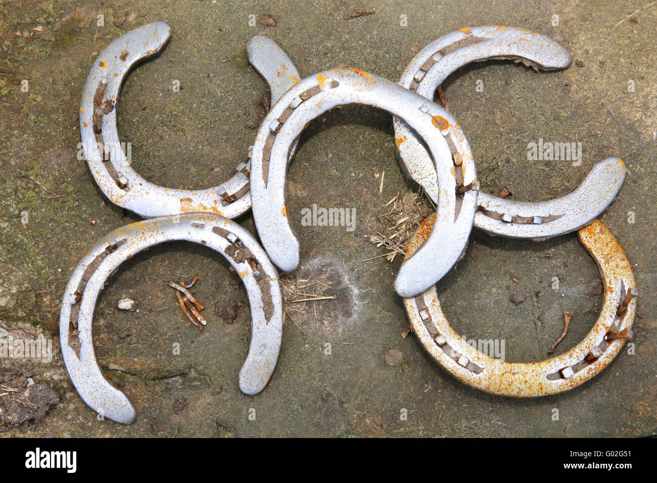 Five old rusty horseshoes at rural horse farm Stock Photo - Alamy