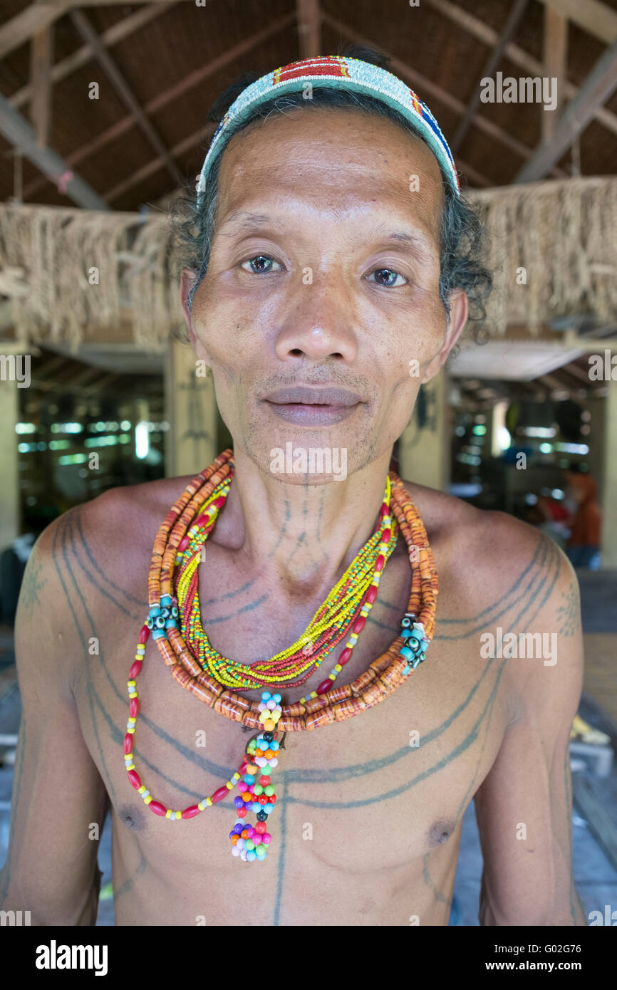Unidentified Mentawai tribe pose for camera.The indigenous inhabitants ...