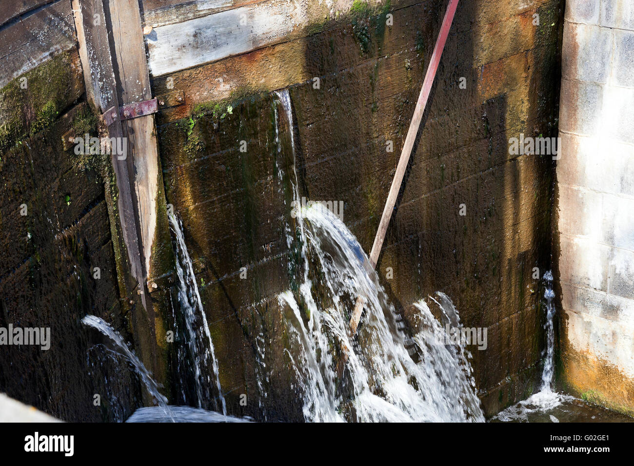 old leaking dam Stock Photo - Alamy