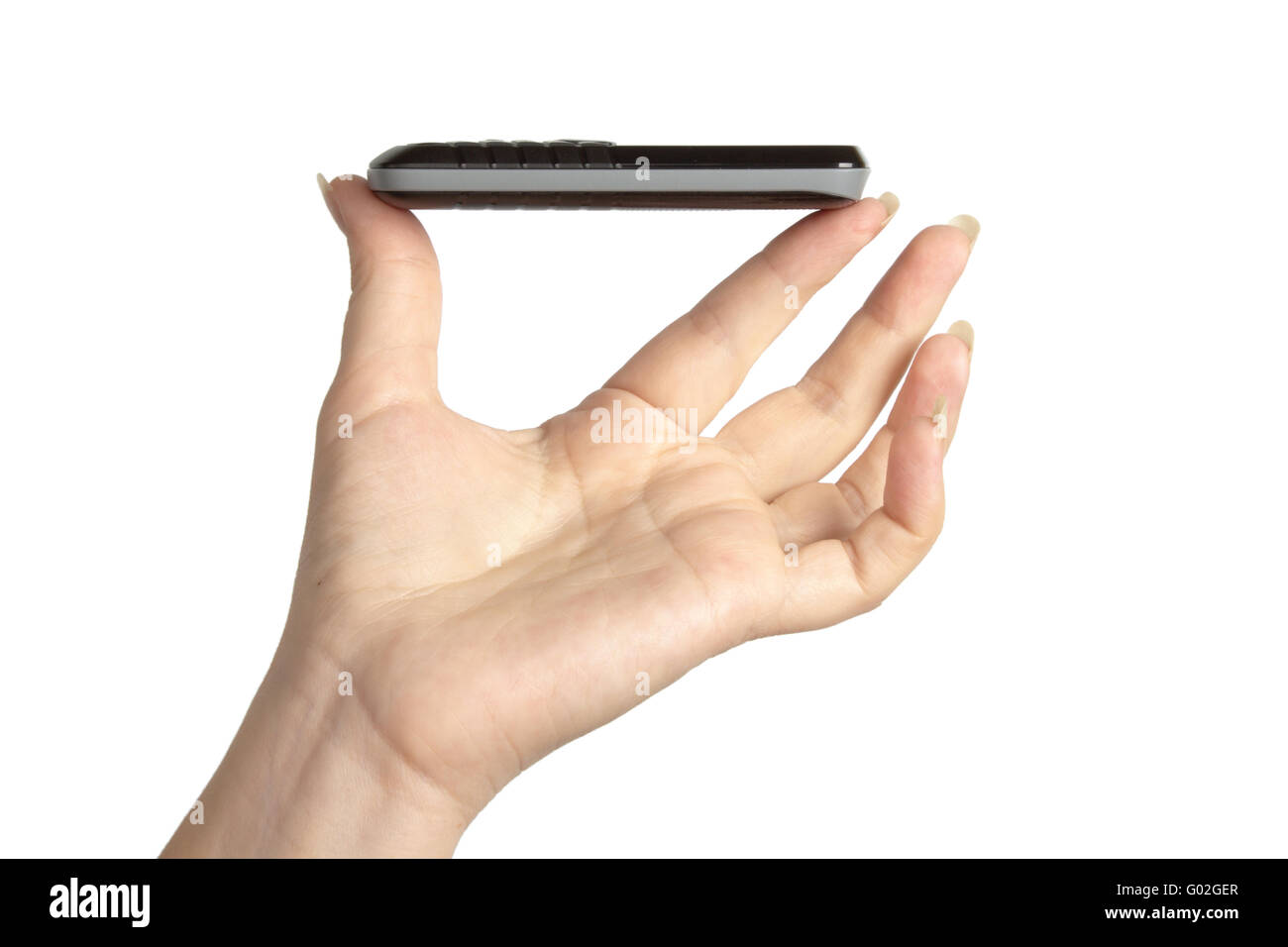 Slim mobile phone in the women's hand isolated on white background ...