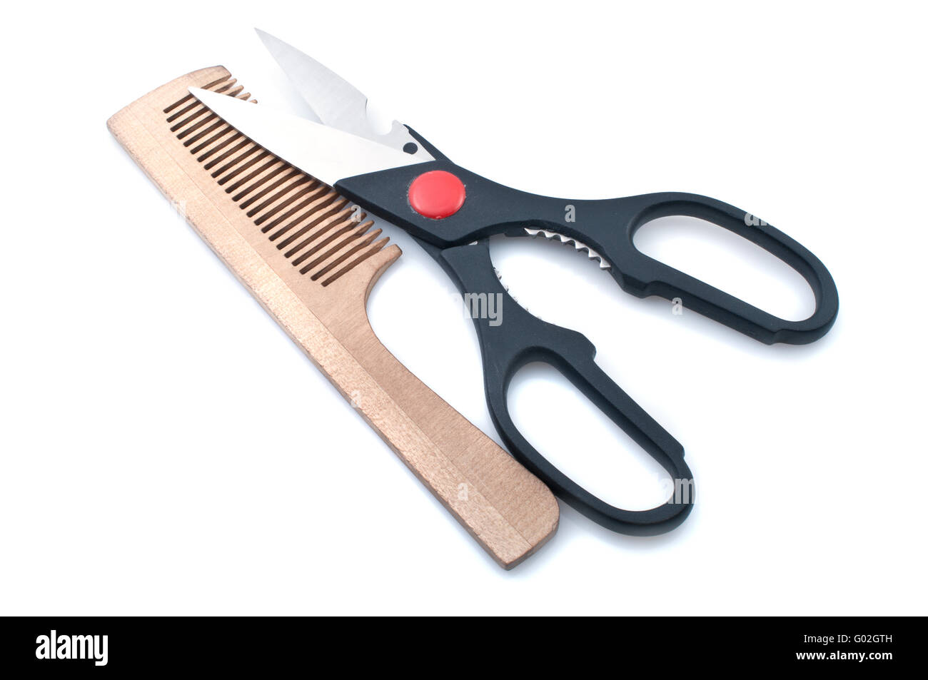 Scissors and combs isolated on a white background Stock Photo - Alamy