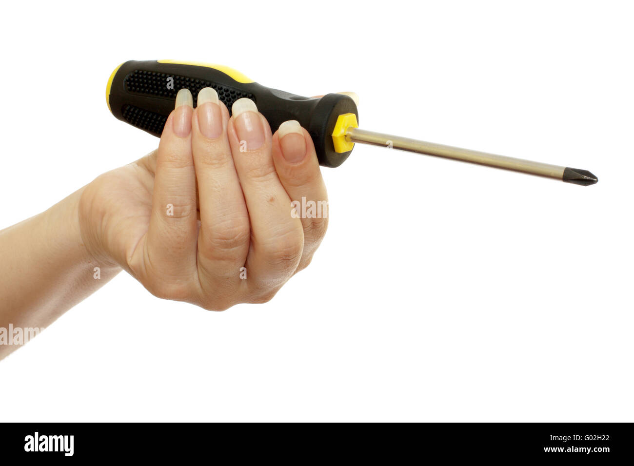 screwdriver in a beautiful female hand isolated on white background ...