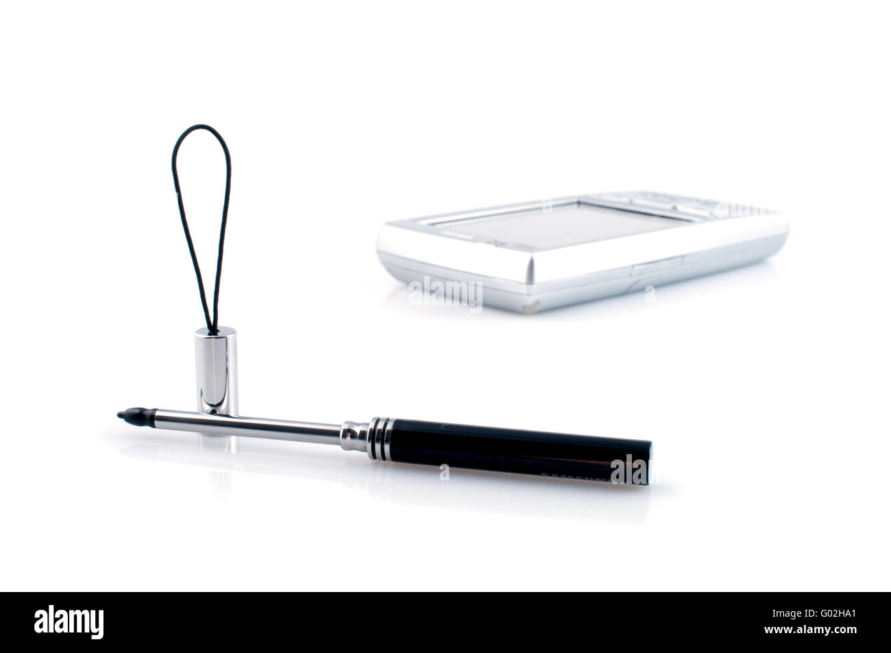 Stylus and PDA communicator isolated on white Stock Photo - Alamy