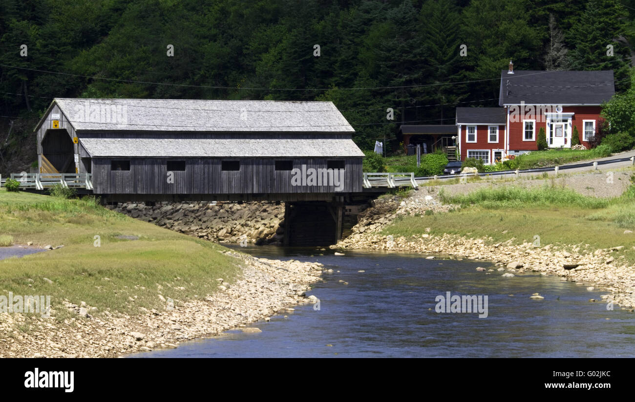 Covered Bridge Over Rocky Stream Stock Photo - Alamy