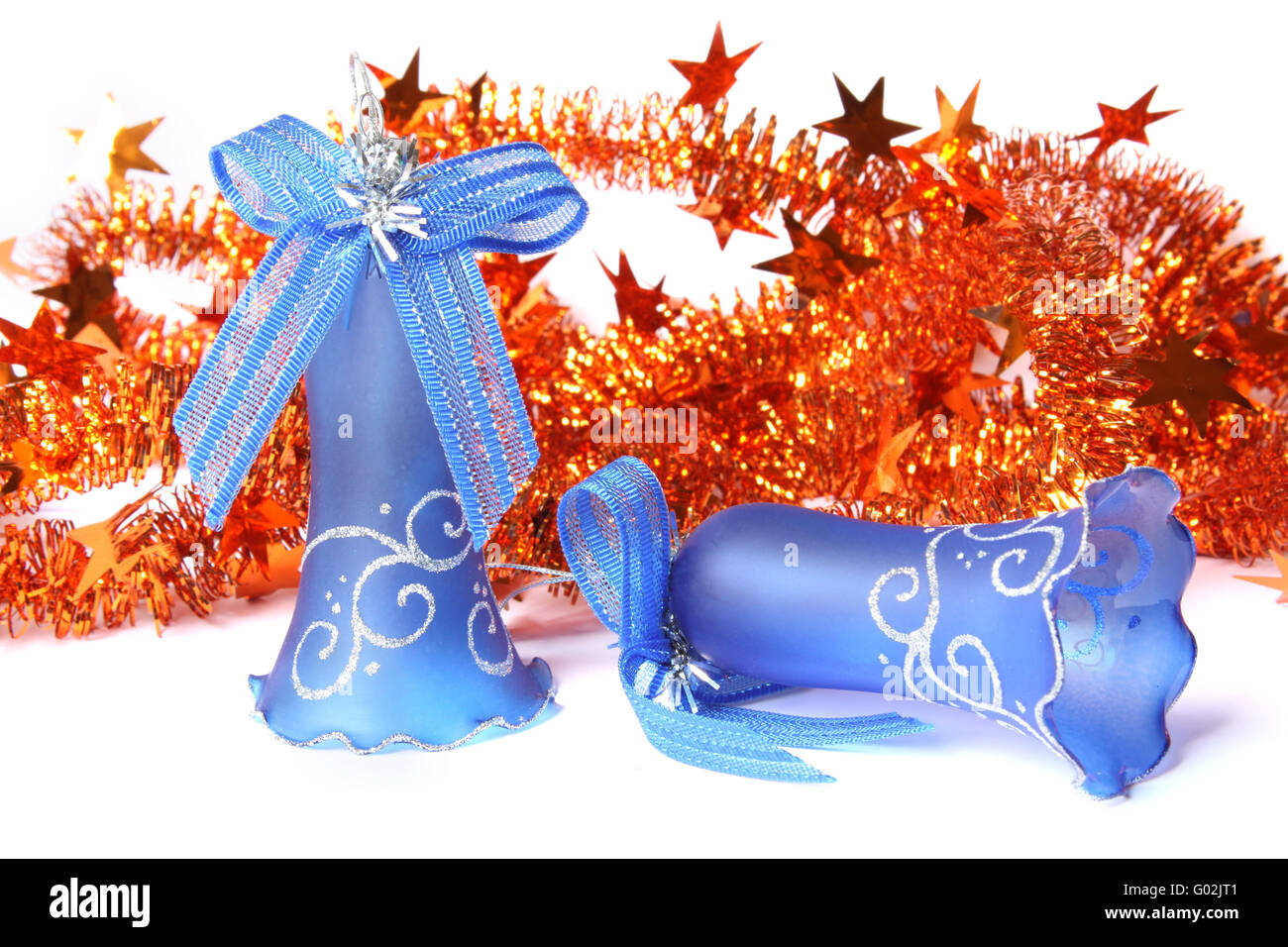 Blue Christmas Bells and tinsel. Isolated on white Stock Photo - Alamy