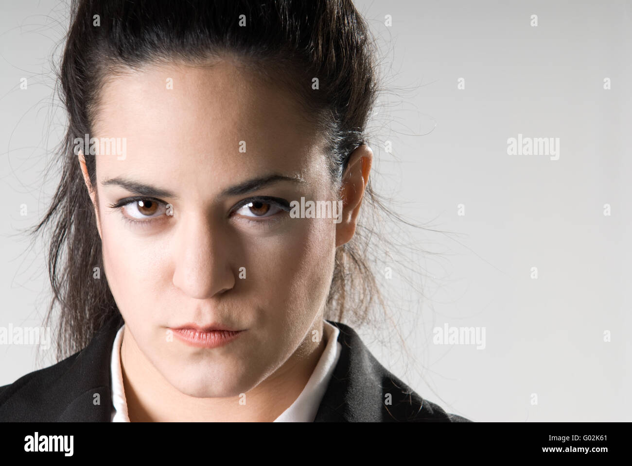 Serious face female hi-res stock photography and images - Alamy