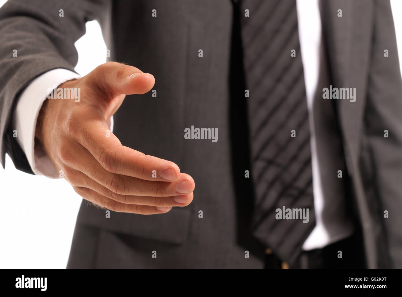 Unrecognizable businessman handshake closeup isolated on white ...