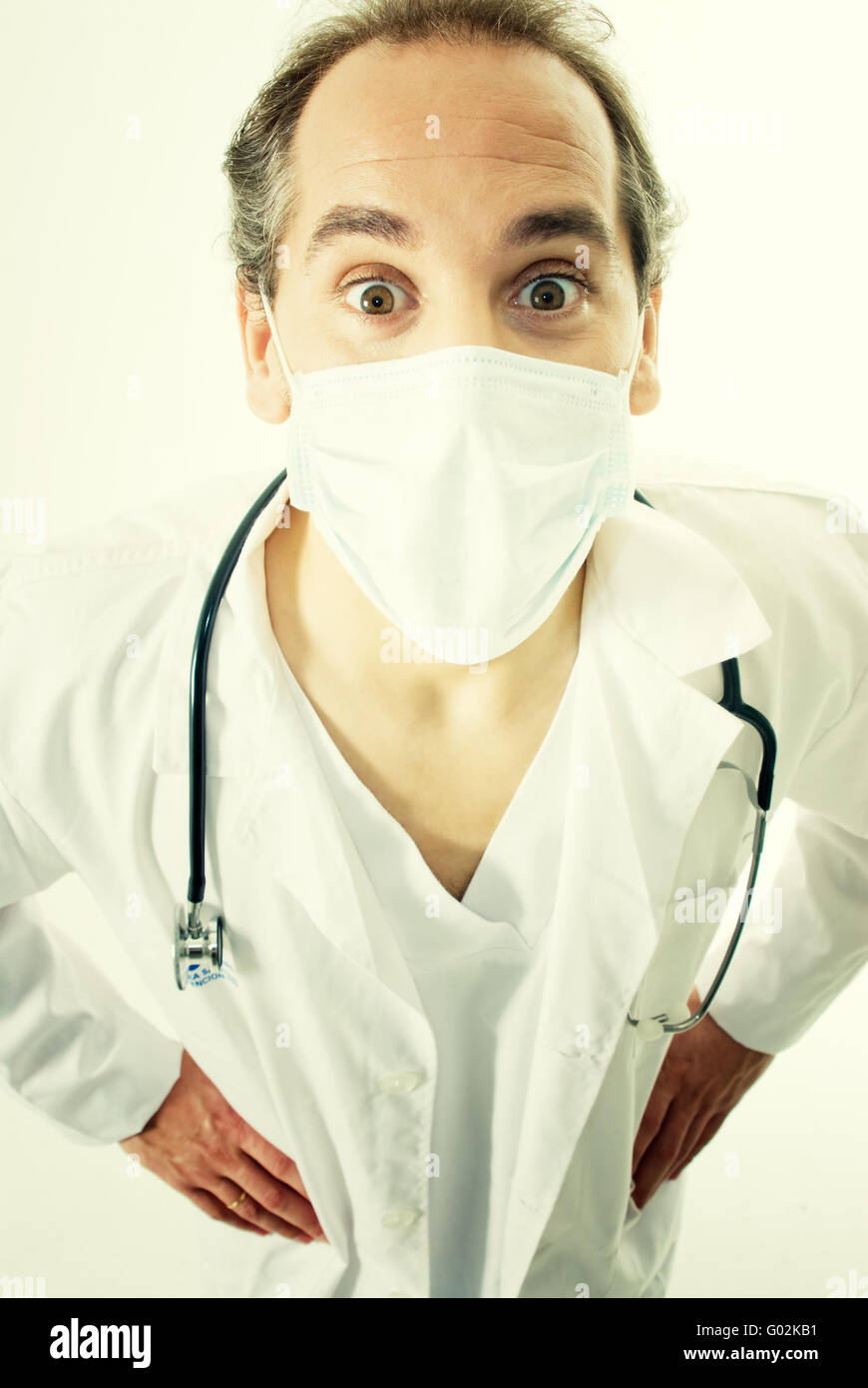 Doctor with stethoscope and flu mask Stock Photo - Alamy
