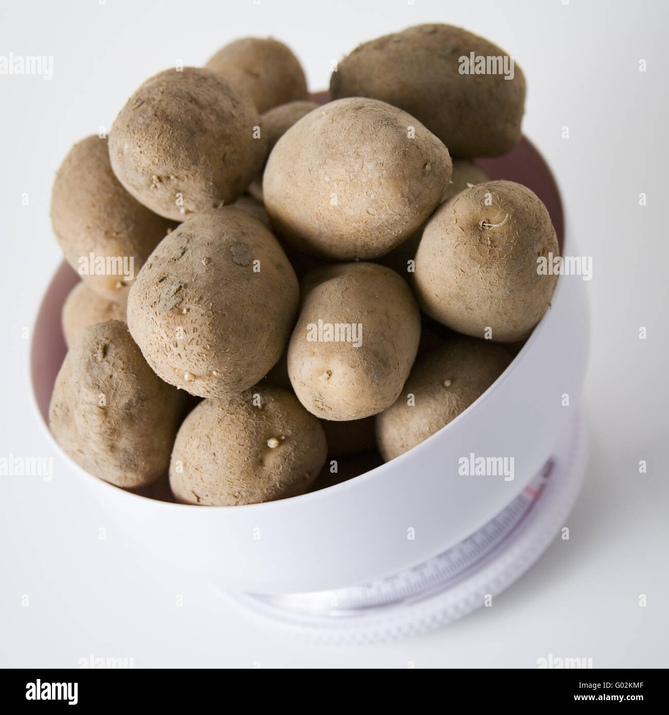 potatoes in a kitchen scale Stock Photo - Alamy