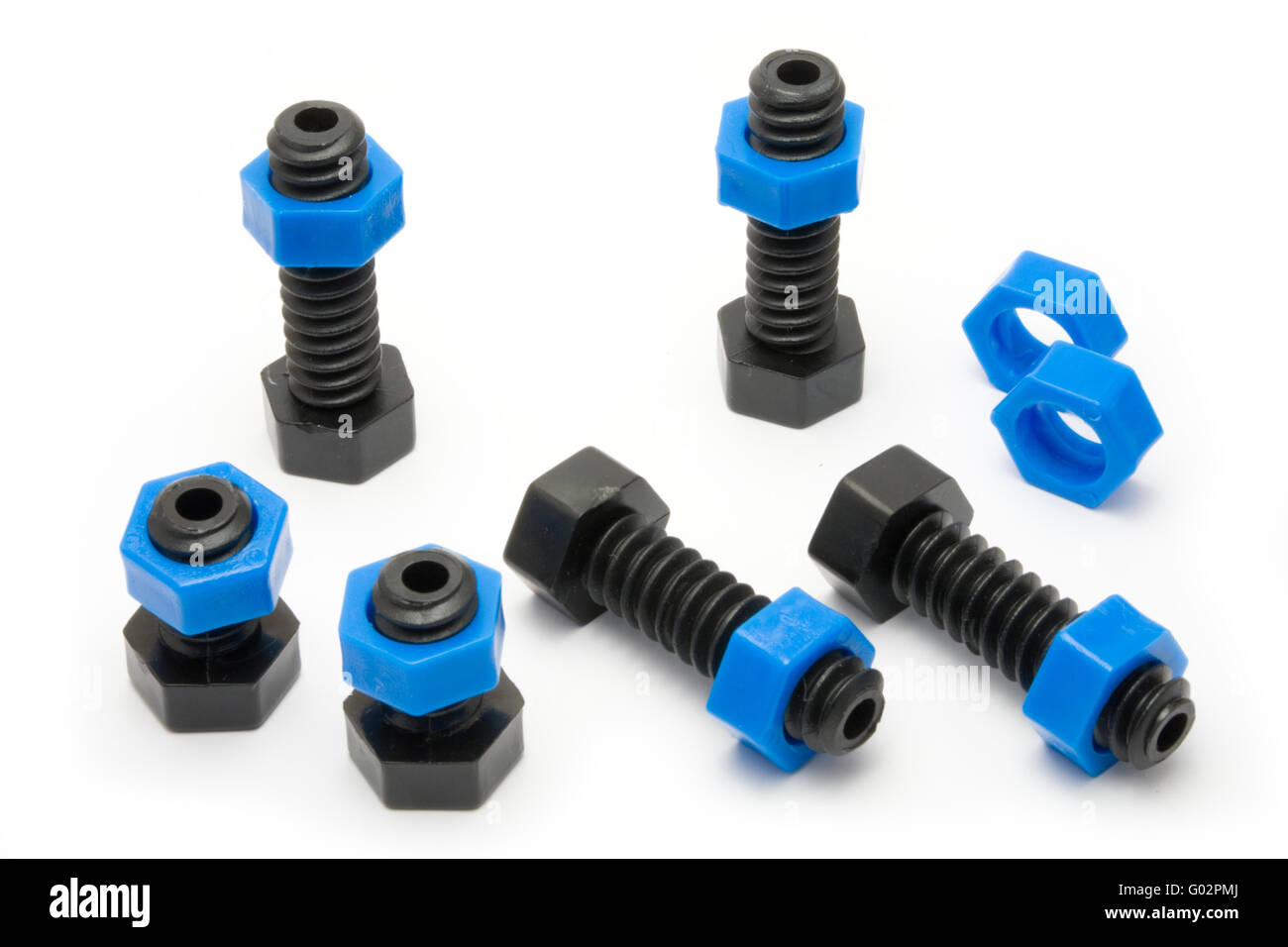 Closeup of plastic nuts and bolts Stock Photo - Alamy