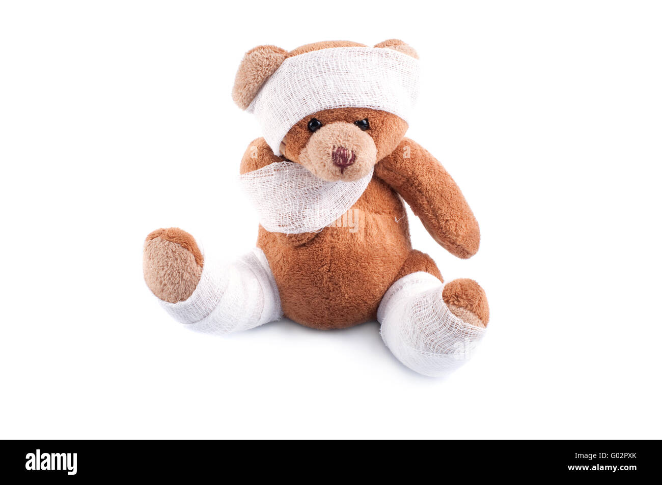 Sick teddy bear wrapped in bandages Stock Photo - Alamy