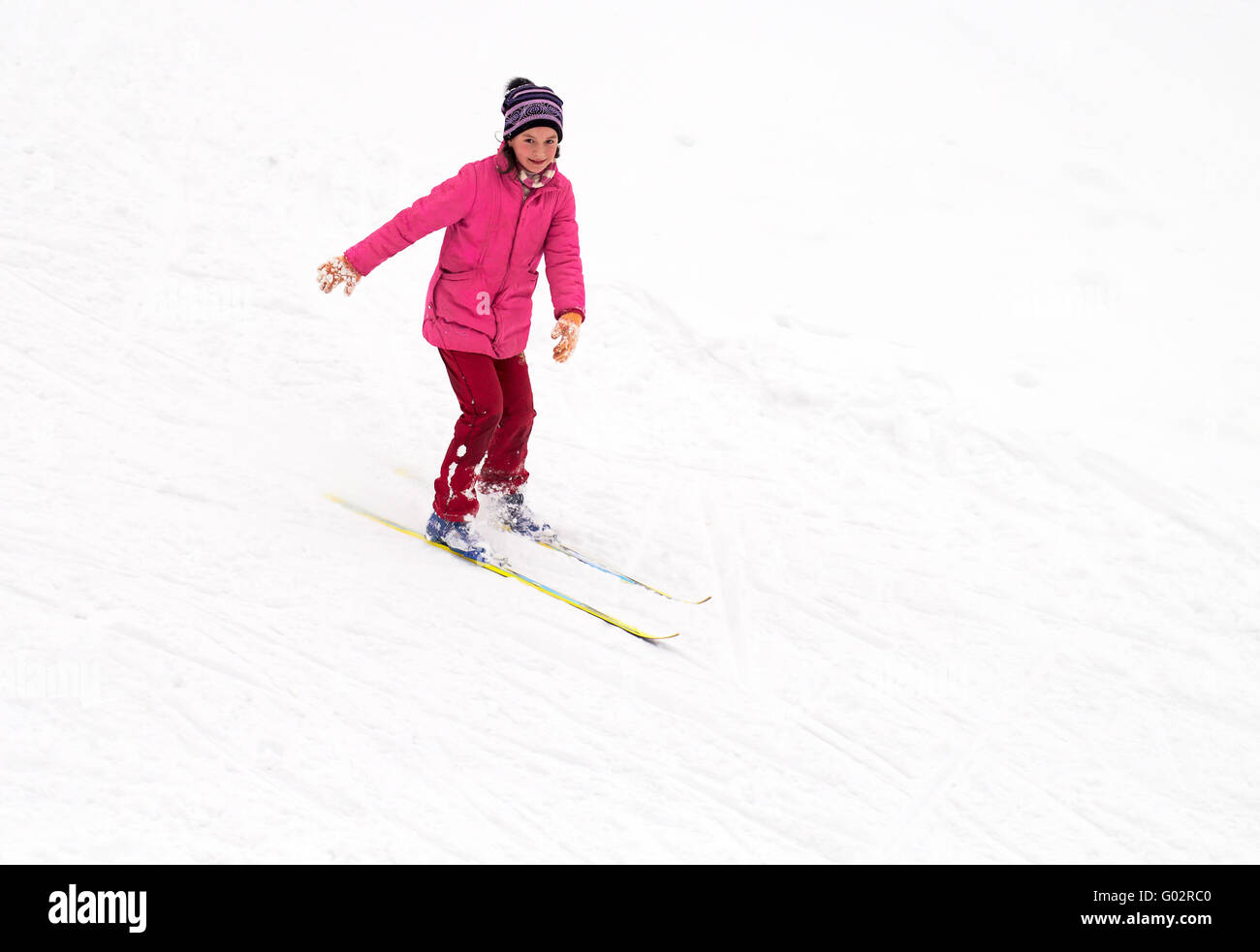 Bright girl Skiing Stock Photo - Alamy