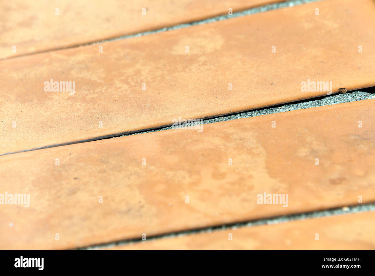 Tiles on the road Stock Photo - Alamy