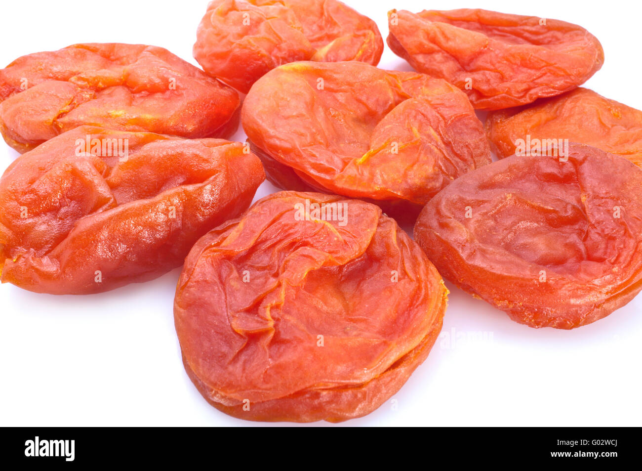 Dried natural apricots isolated on white background Stock Photo - Alamy