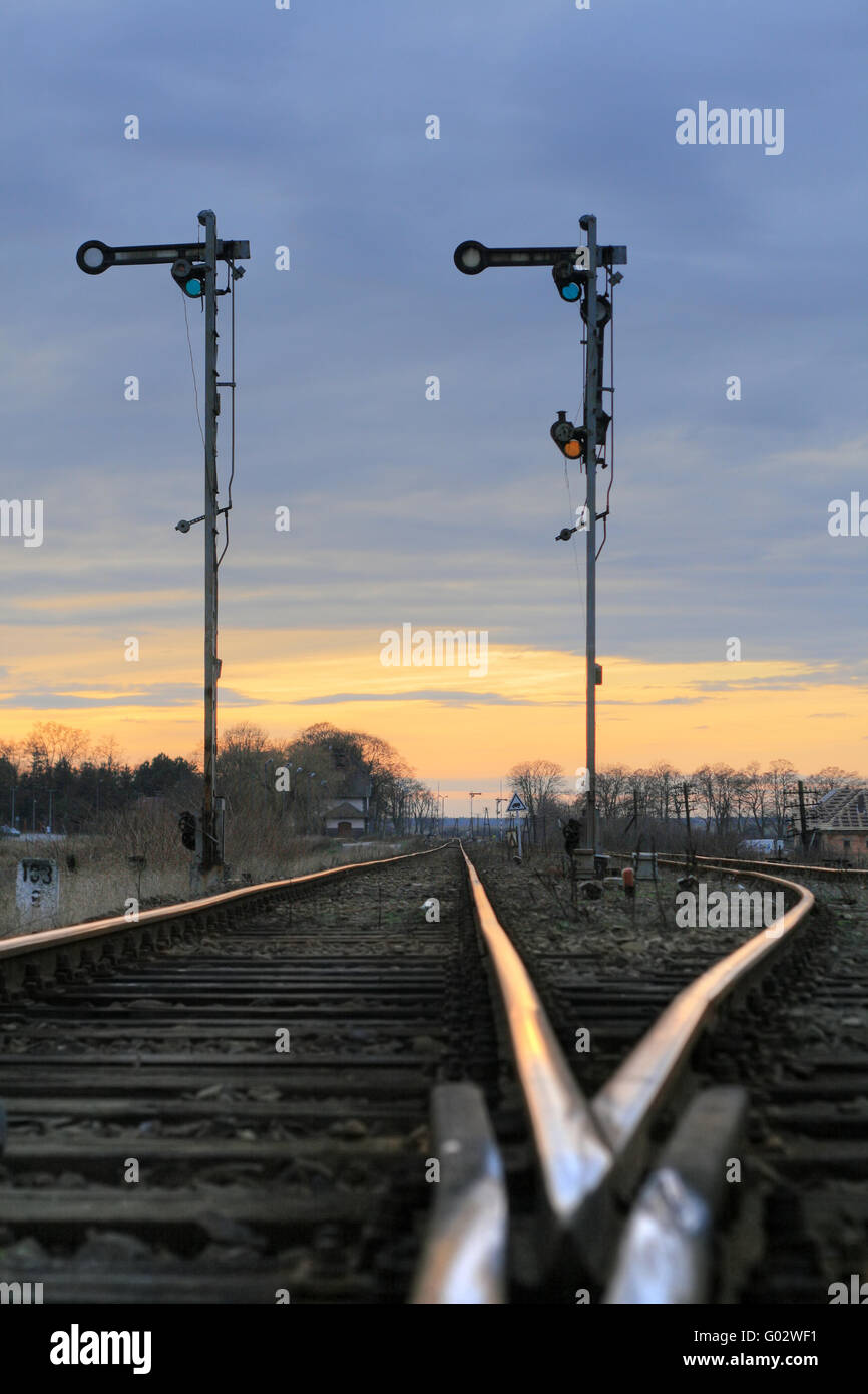 Old railway semaphores and rails against the dramatic sky Stock Photo ...