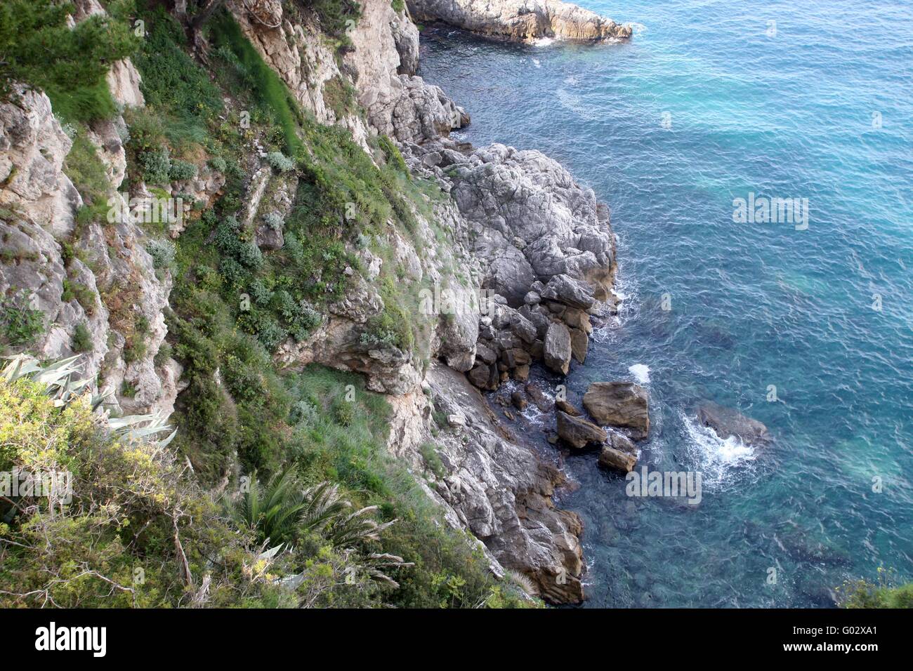 Pictorial blue Adriatic sea with rocks Stock Photo - Alamy