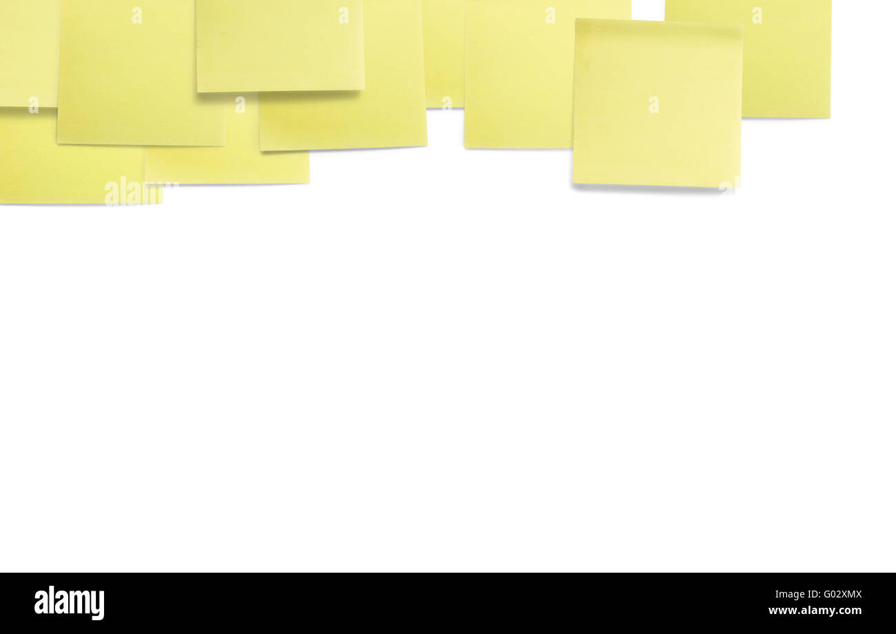 A set of office/work related yellow coloured paper sticky notes ...