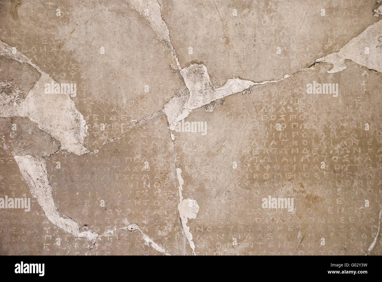 Stone background with antique Greek inscriptions Stock Photo - Alamy