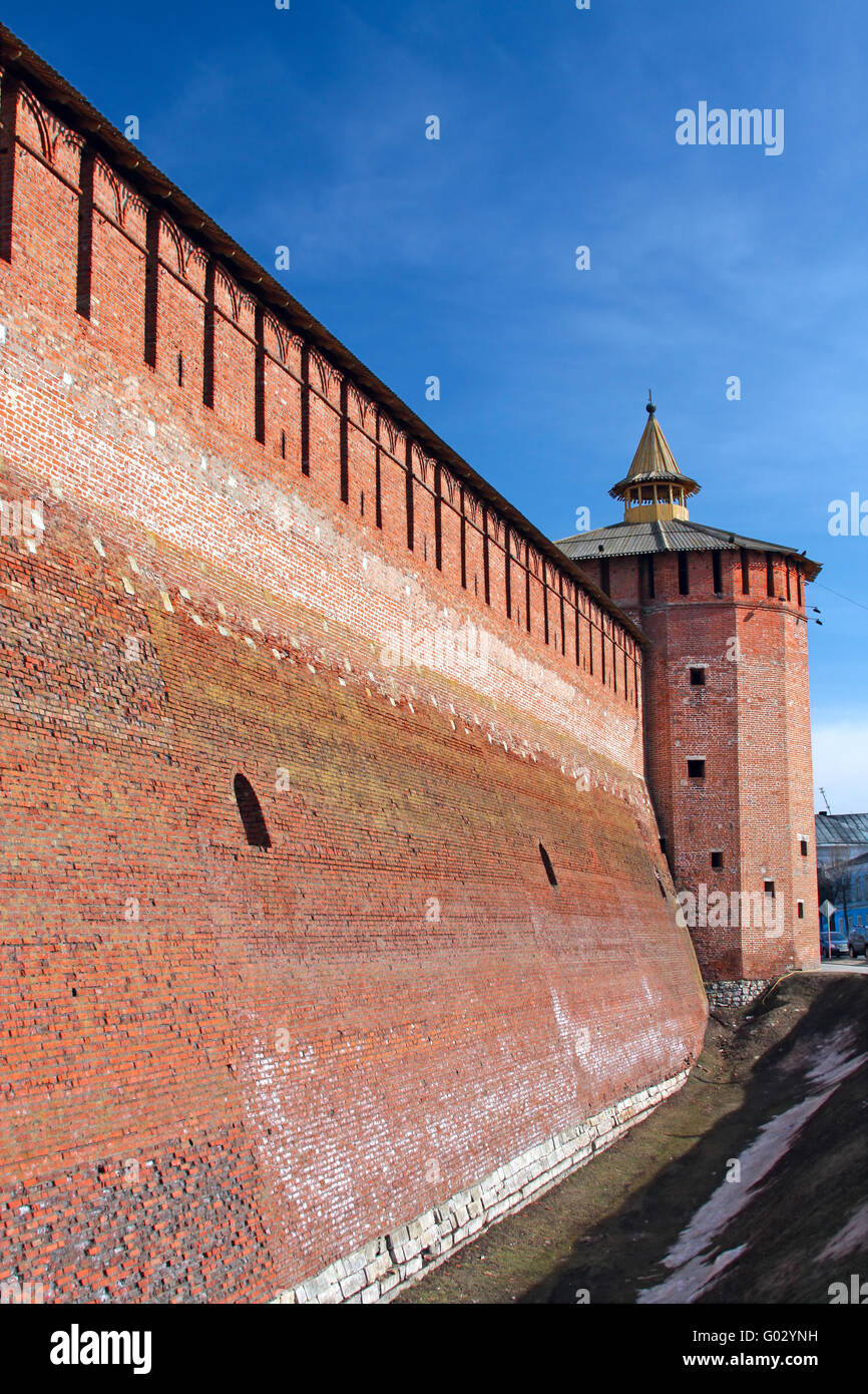 The wall and tower of big castle of red brick Stock Photo - Alamy