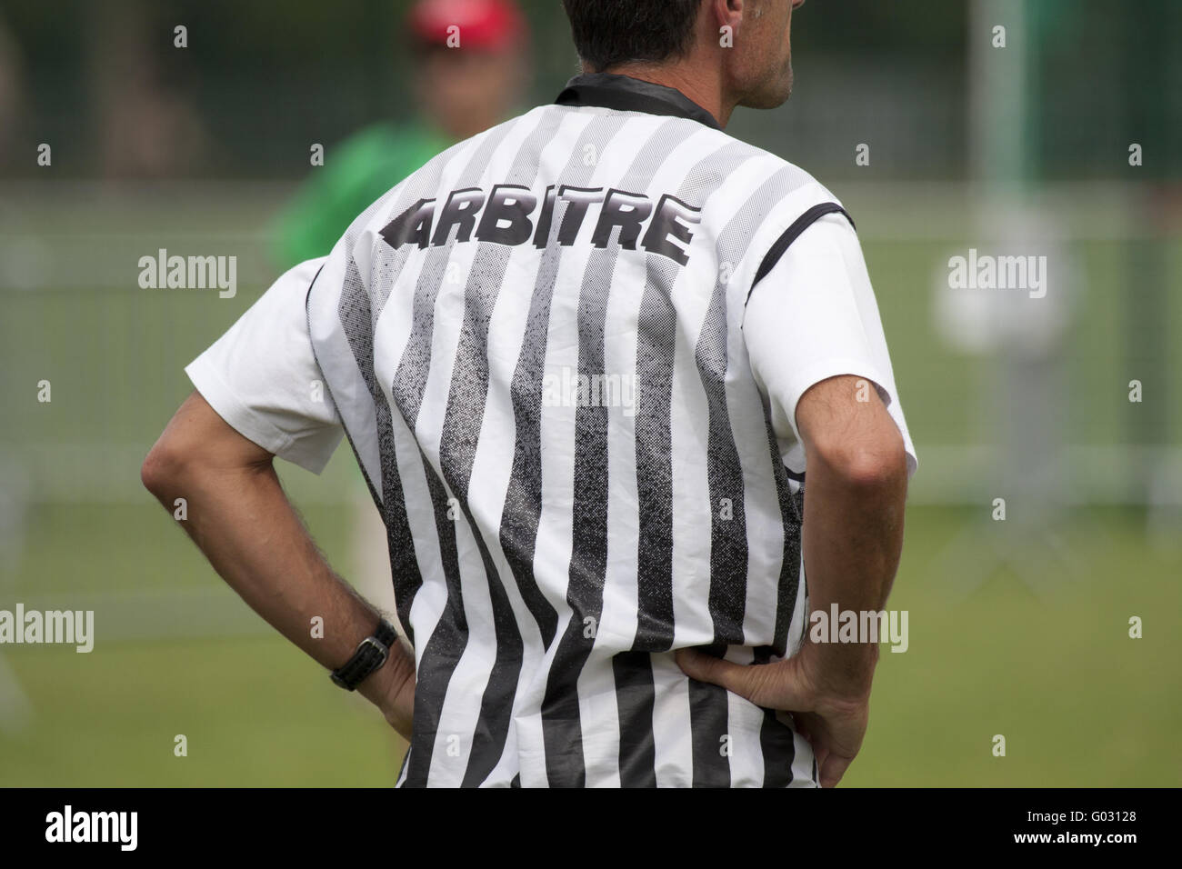 Triathlon referee, hands on hips Stock Photo - Alamy