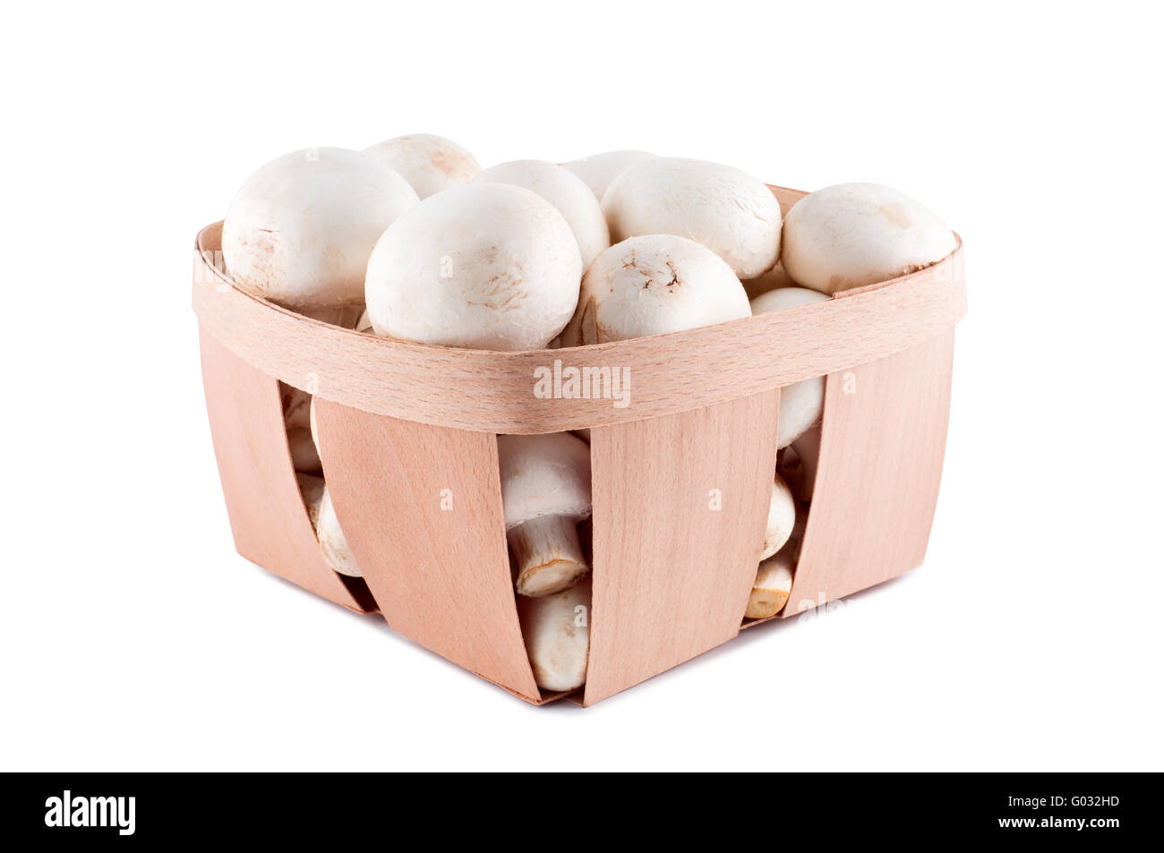 Mushrooms in box isolated on white background Stock Photo - Alamy