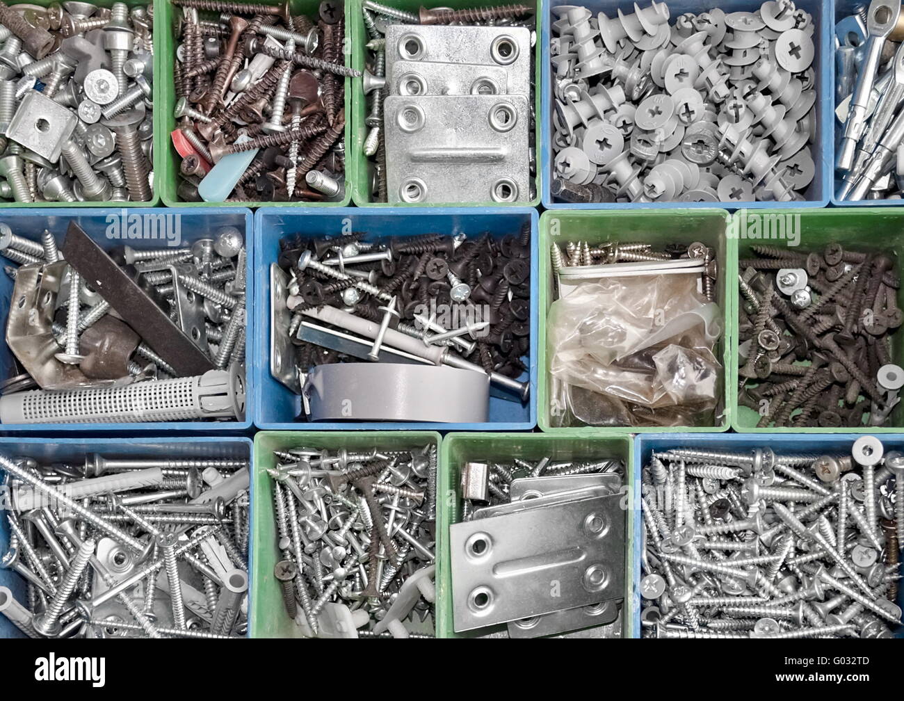 Toolbox full of metallic screws and consumable hardware Stock Photo - Alamy