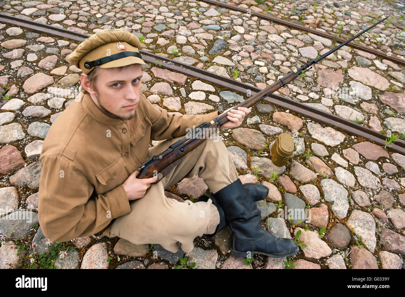 Soldier with boiler and gun in retro style picture Stock Photo - Alamy