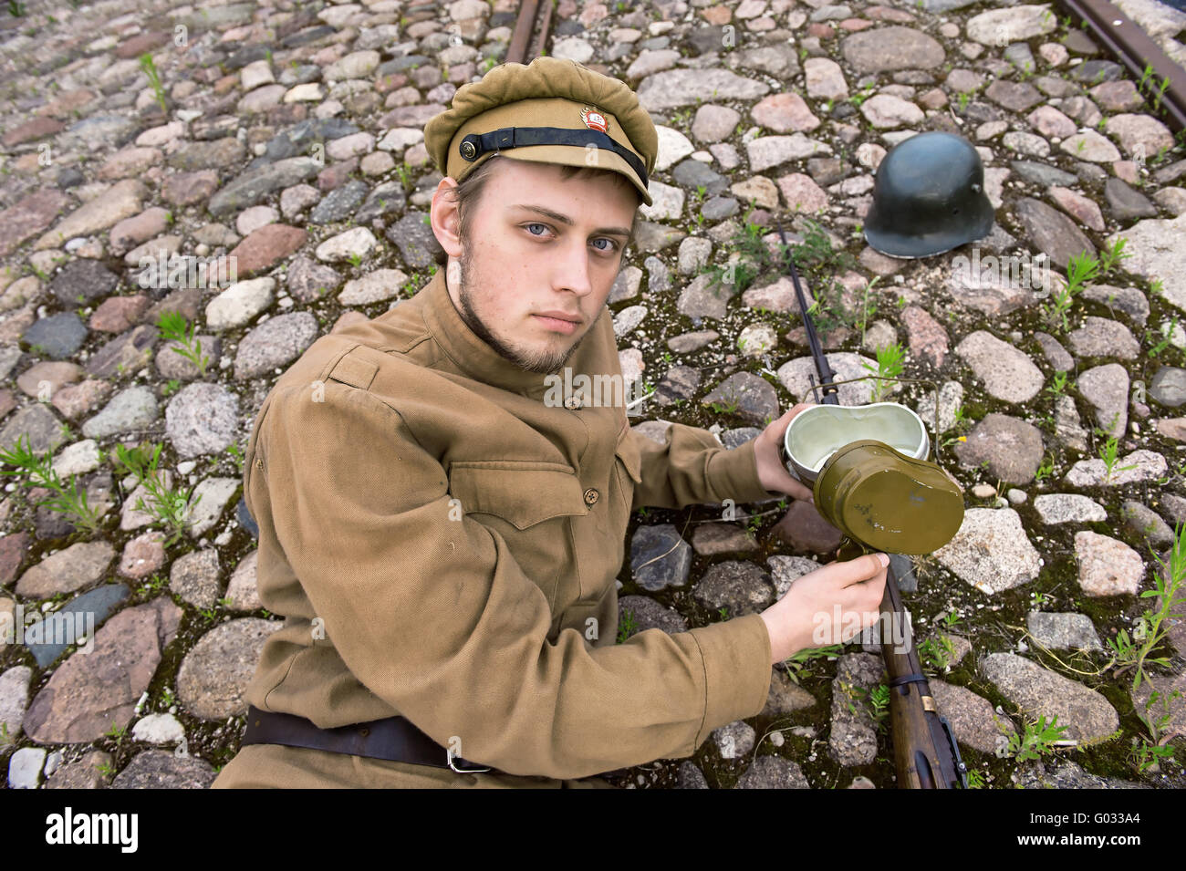 Soldier with boiler and gun in retro style picture Stock Photo - Alamy