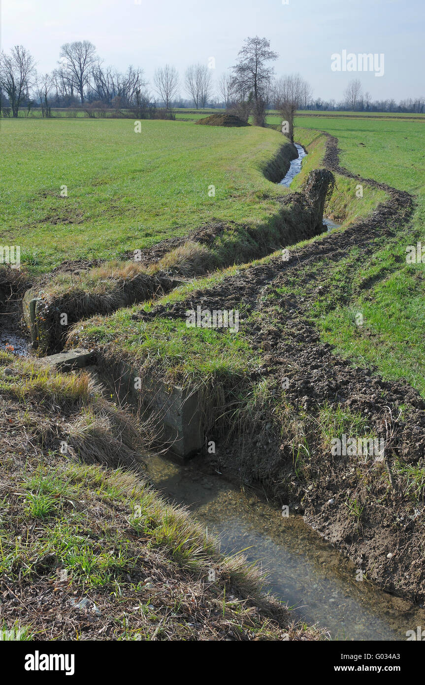 bending ditch in winter country Stock Photo - Alamy