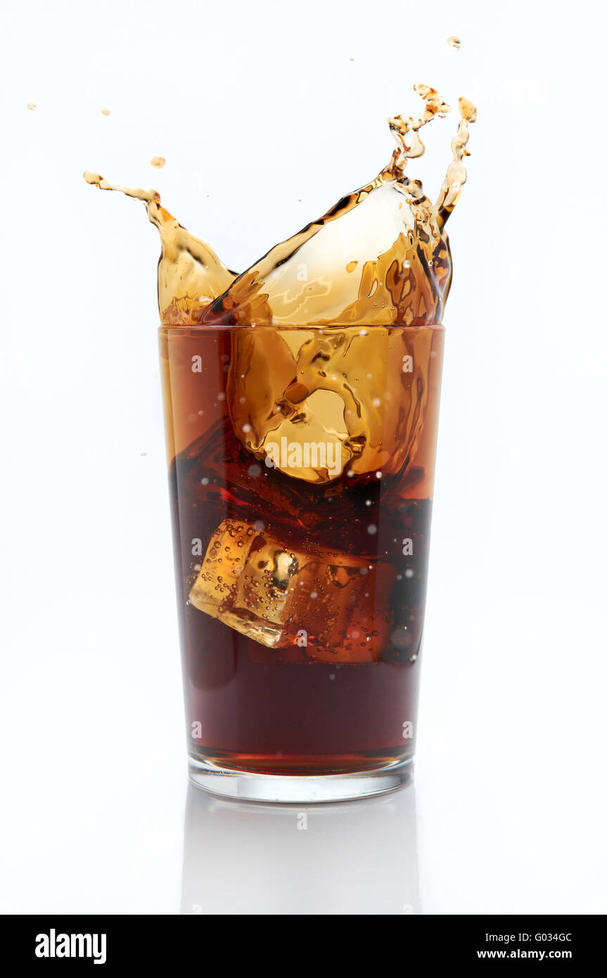 Glass of cola with splash Stock Photo - Alamy