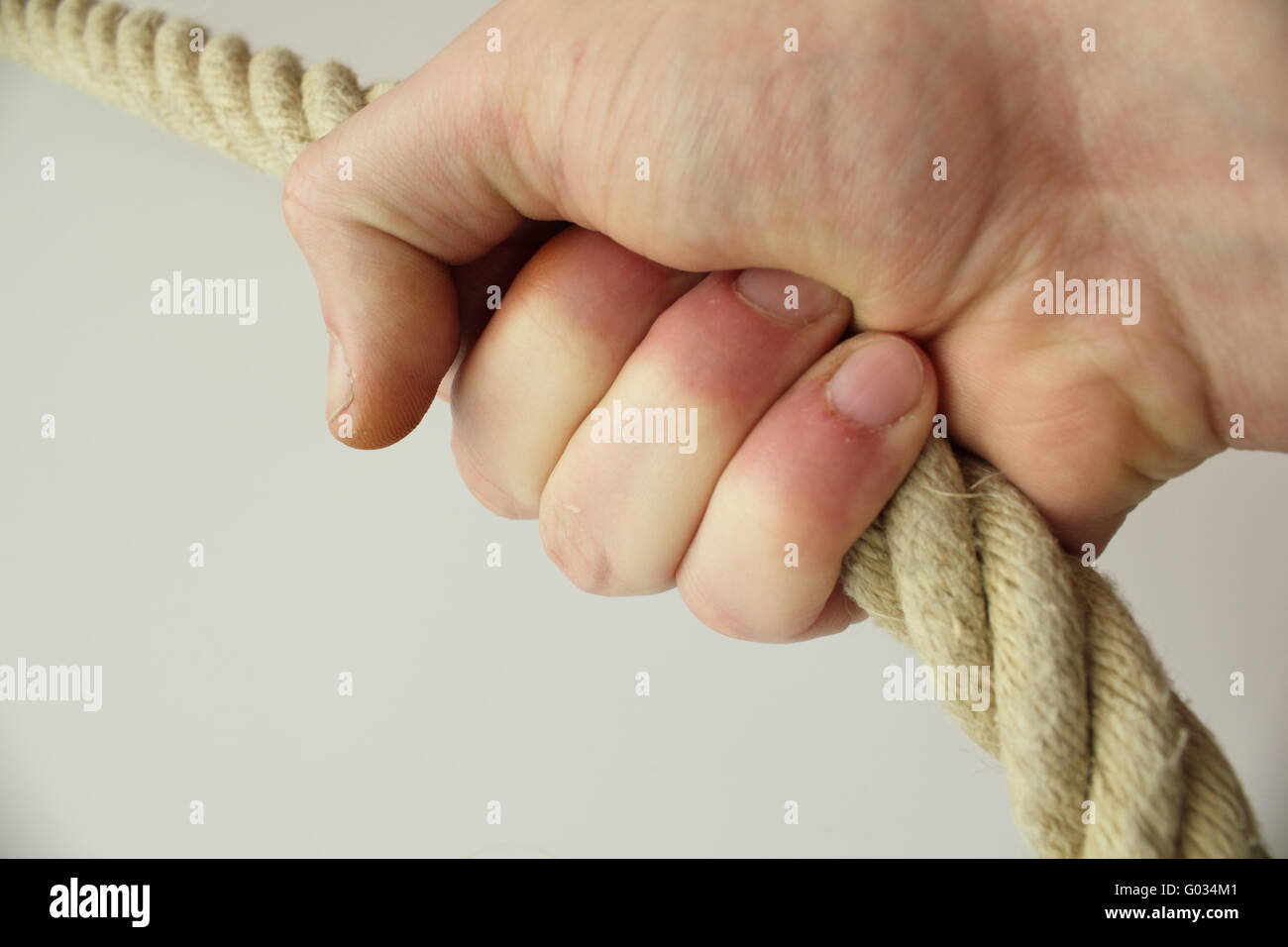 hand on rope Stock Photo - Alamy