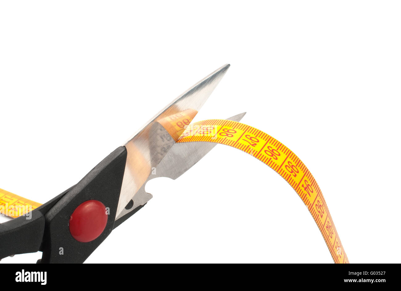 scissors cutting a measuring on white background Stock Photo - Alamy