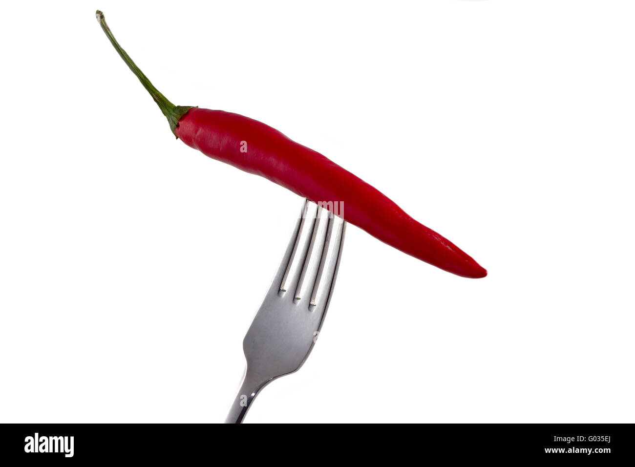 Red hot chili pepper on a fork Stock Photo - Alamy