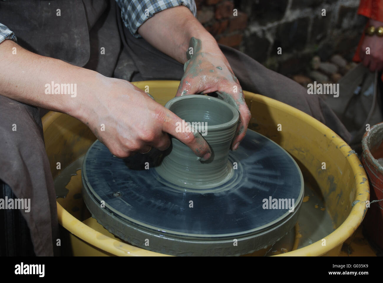 potter's wheel and hands of craftsman Stock Photo - Alamy