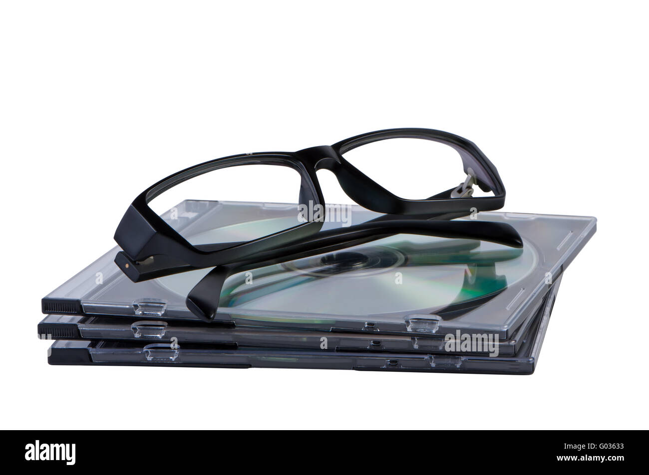Eyeglasses on stack of CD DVD discs isolated Stock Photo - Alamy