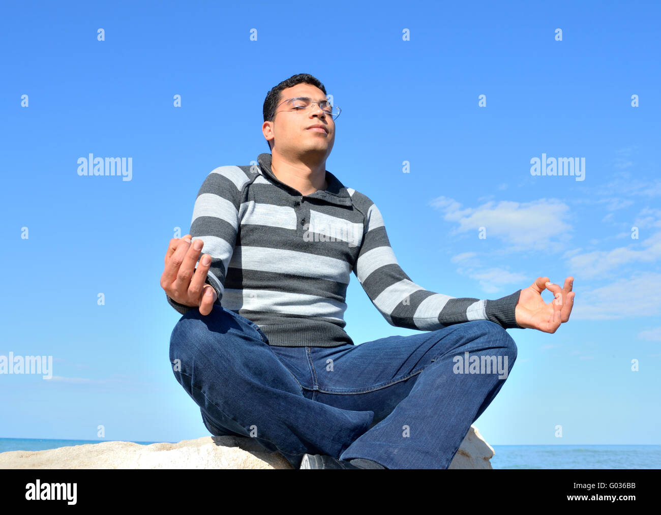 Arab man meditating Stock Photo - Alamy