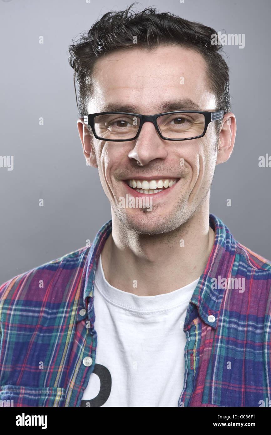 young handsome guy with glasses smiling Stock Photo - Alamy young handsome guy with glasses smiling Stock Photo - Alamy