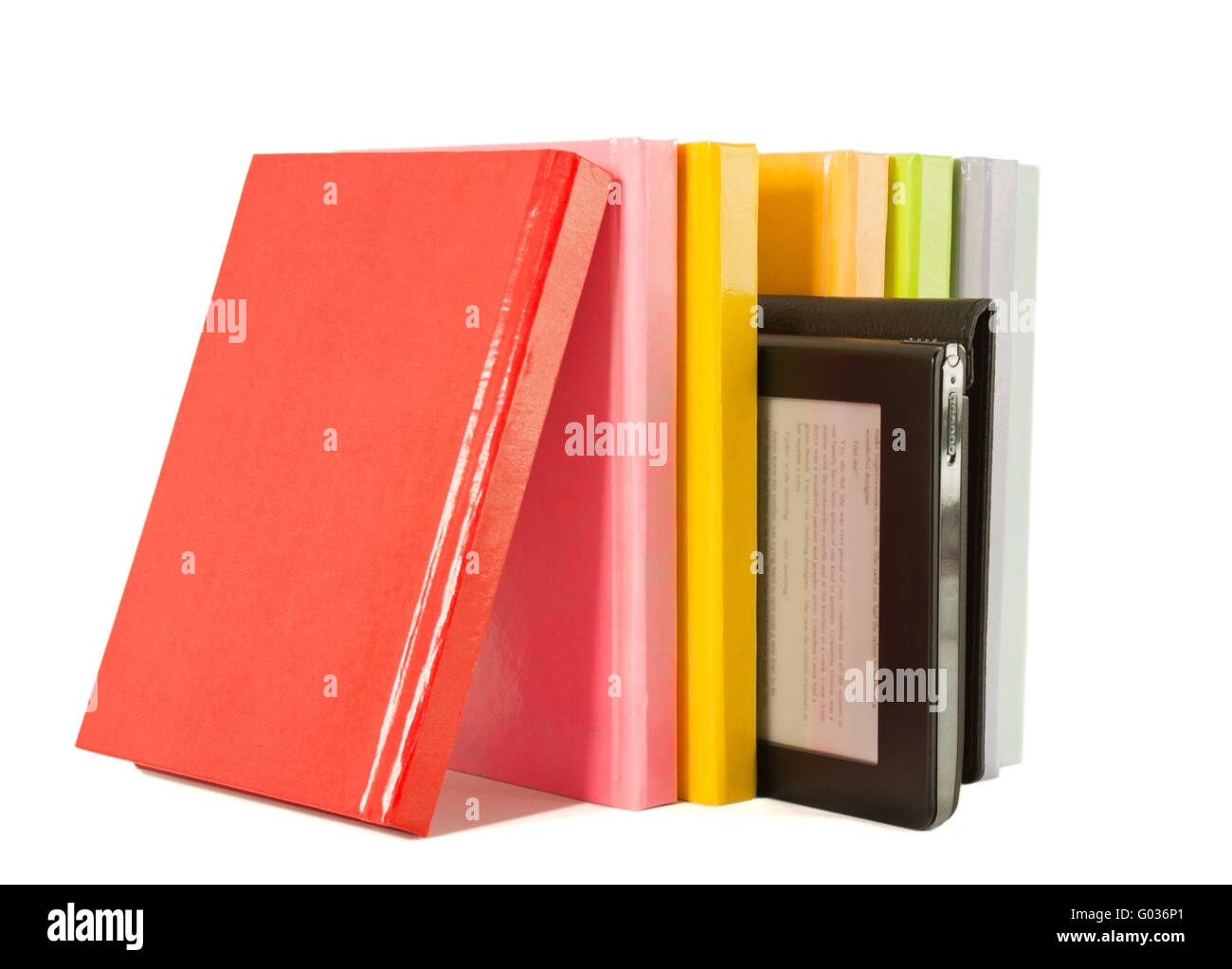 Row of colorful books and electronic book reader o Stock Photo - Alamy