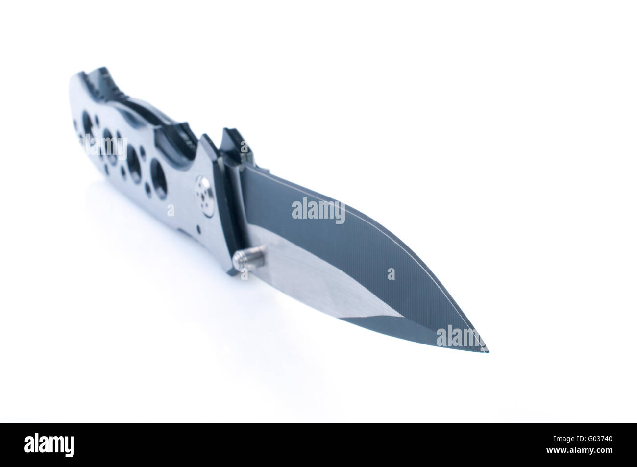 Pocket folder knifen on white background Stock Photo - Alamy