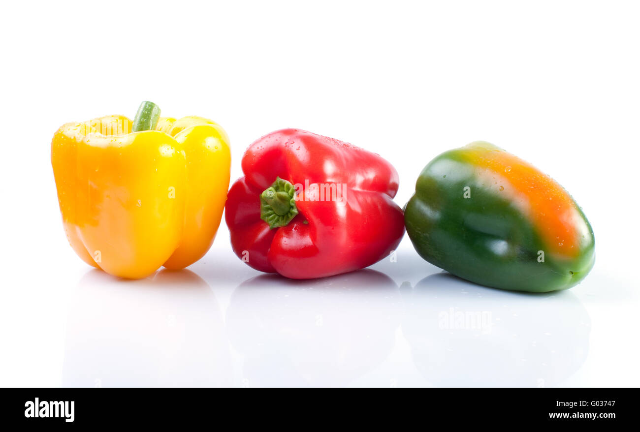 Colored peppers isolated on white background Stock Photo - Alamy