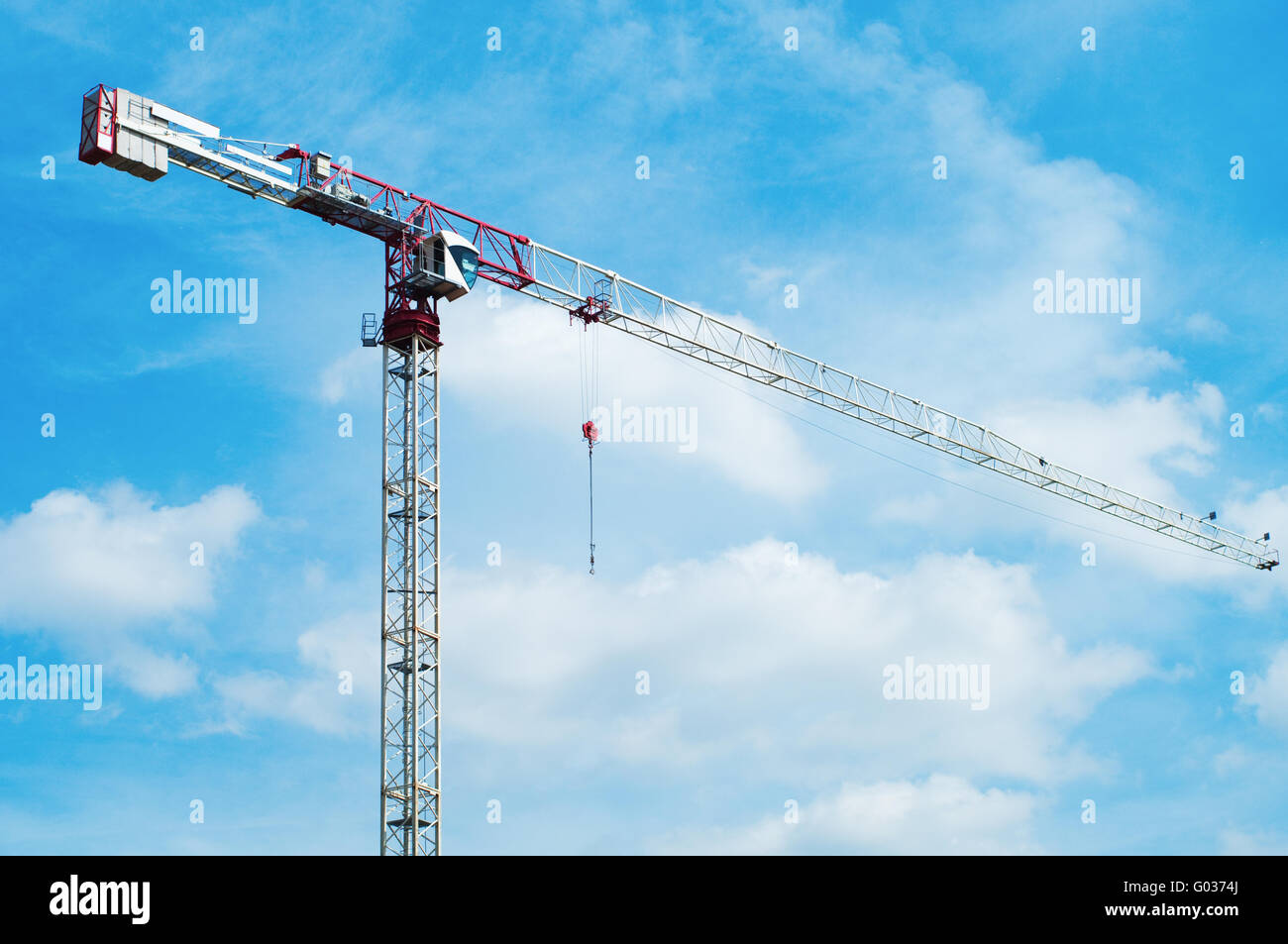 Construction crane scene opposite blue sky Stock Photo - Alamy