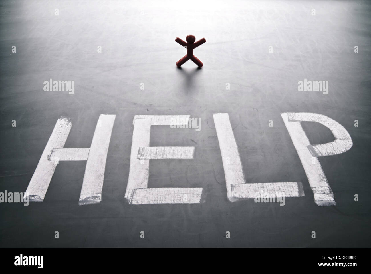 Help word and single person with back light shadow Stock Photo - Alamy