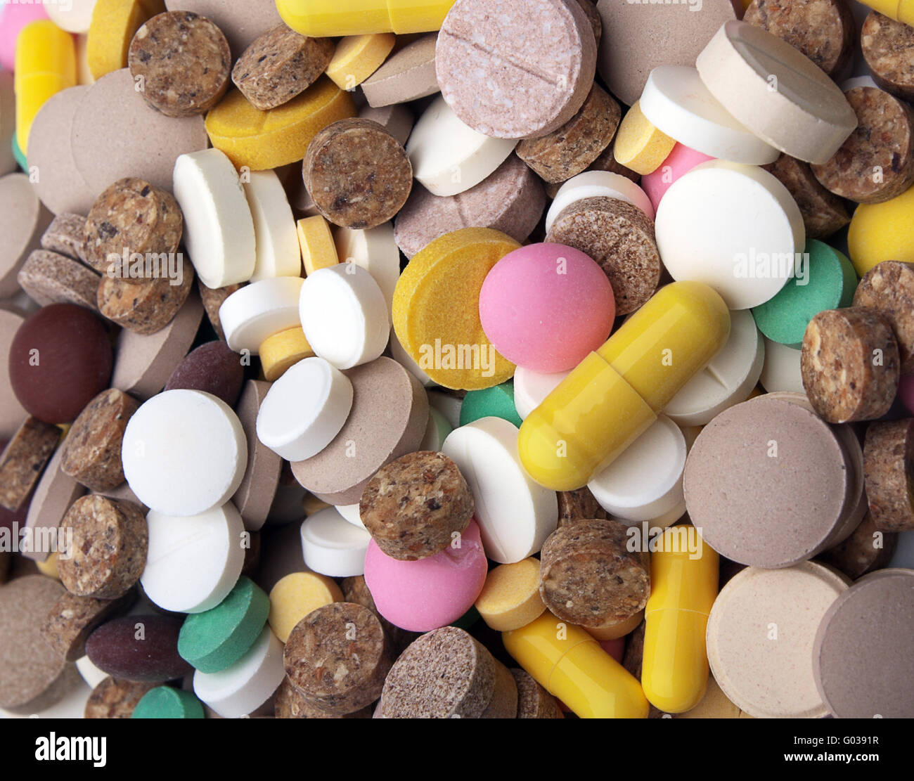 the medical background - heap of colored tablets Stock Photo - Alamy