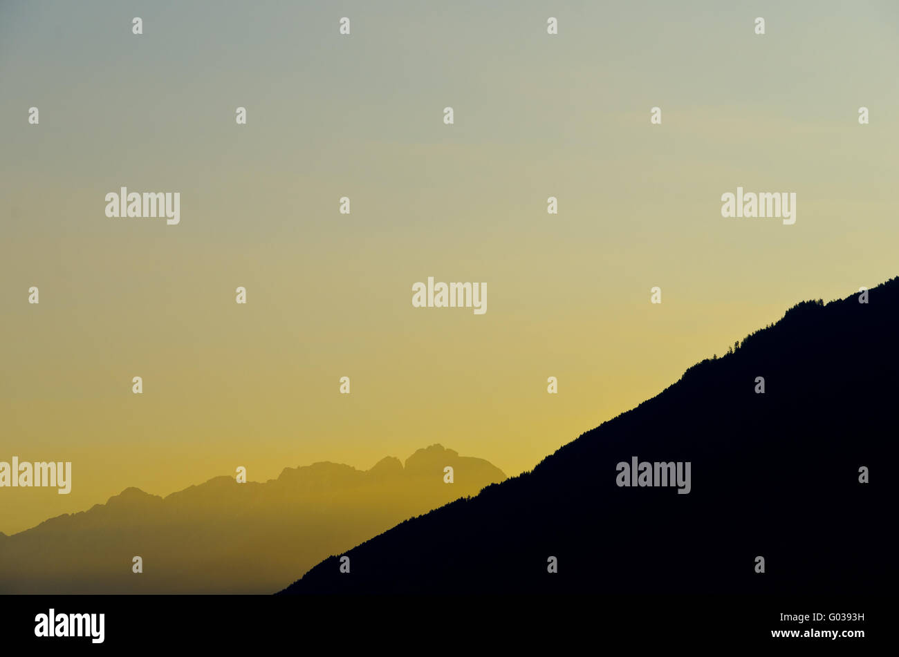 Mountains at sunrise Stock Photo - Alamy