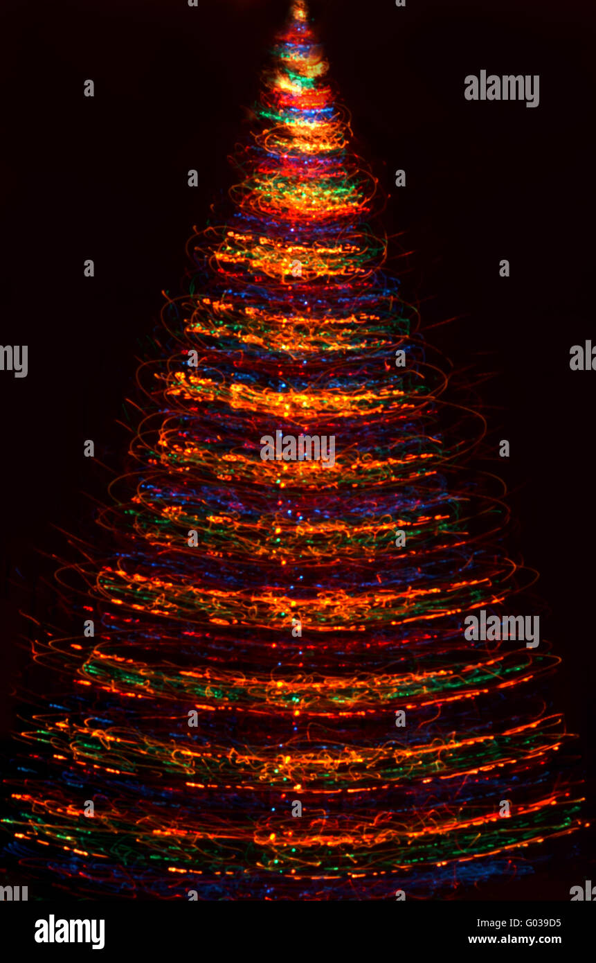Christams tree made of colourful light streaks Stock Photo - Alamy