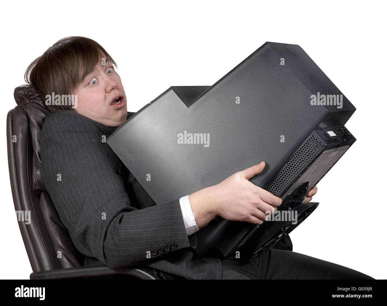 The man the holding monitor on a white background Stock Photo - Alamy