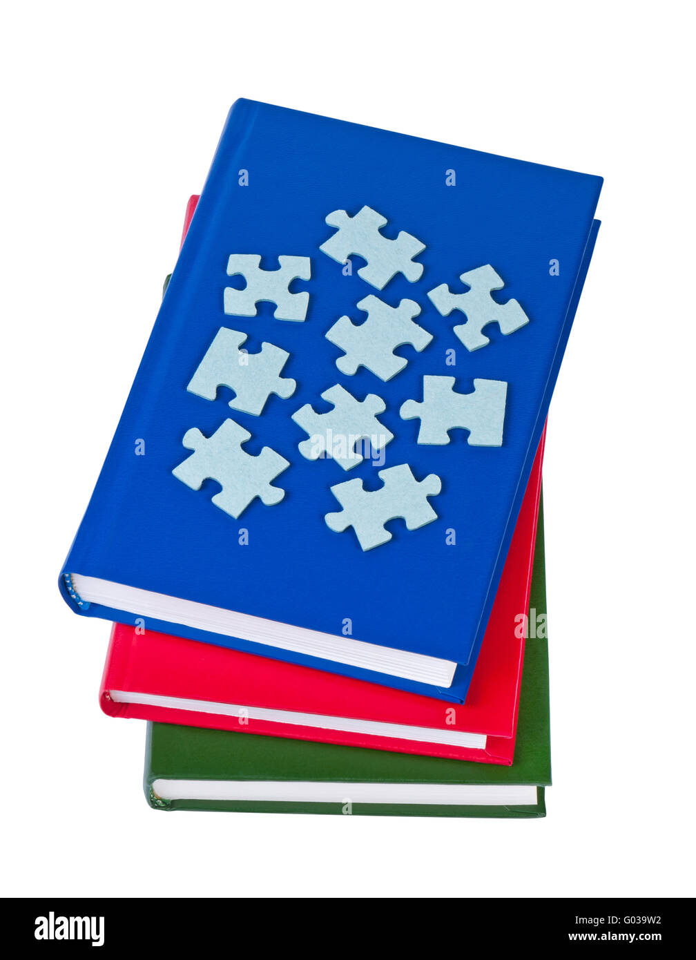 Books with puzzles isolated on white background Stock Photo - Alamy